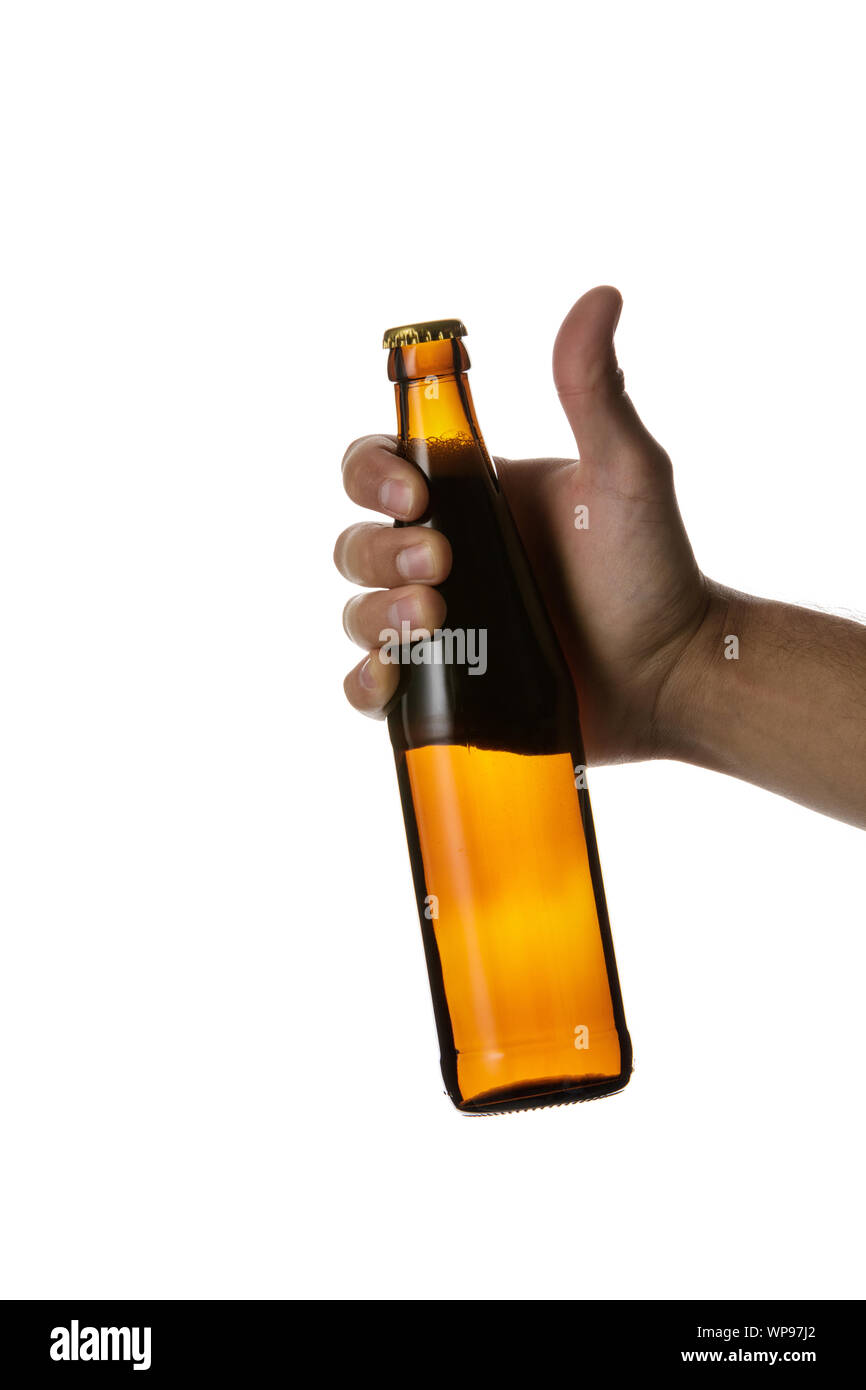 male hand holding brown beer bottle without label isolated on white ...