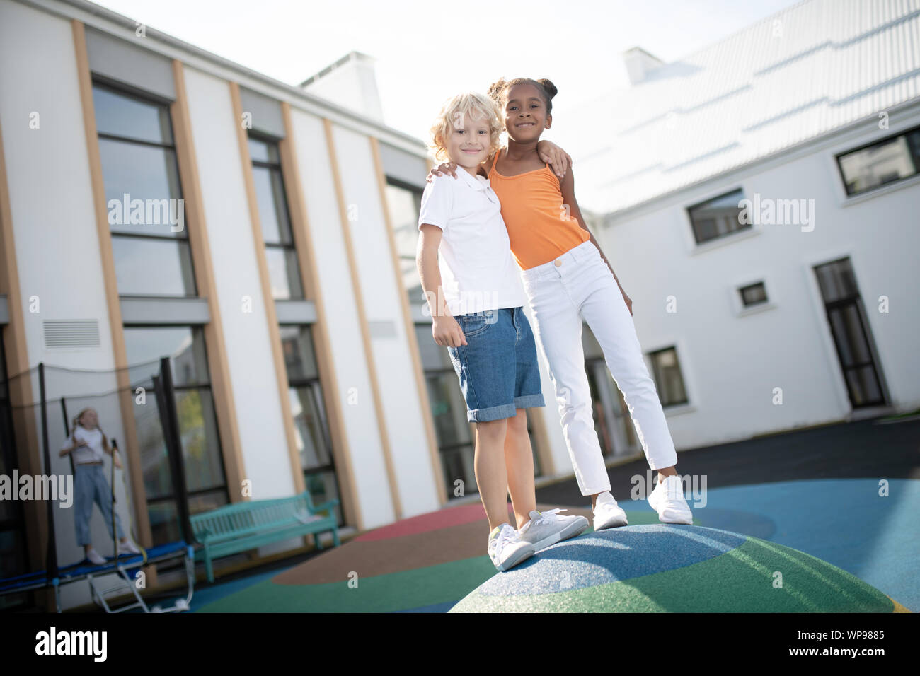 Blonde children playing outside hi-res stock photography and images - Alamy
