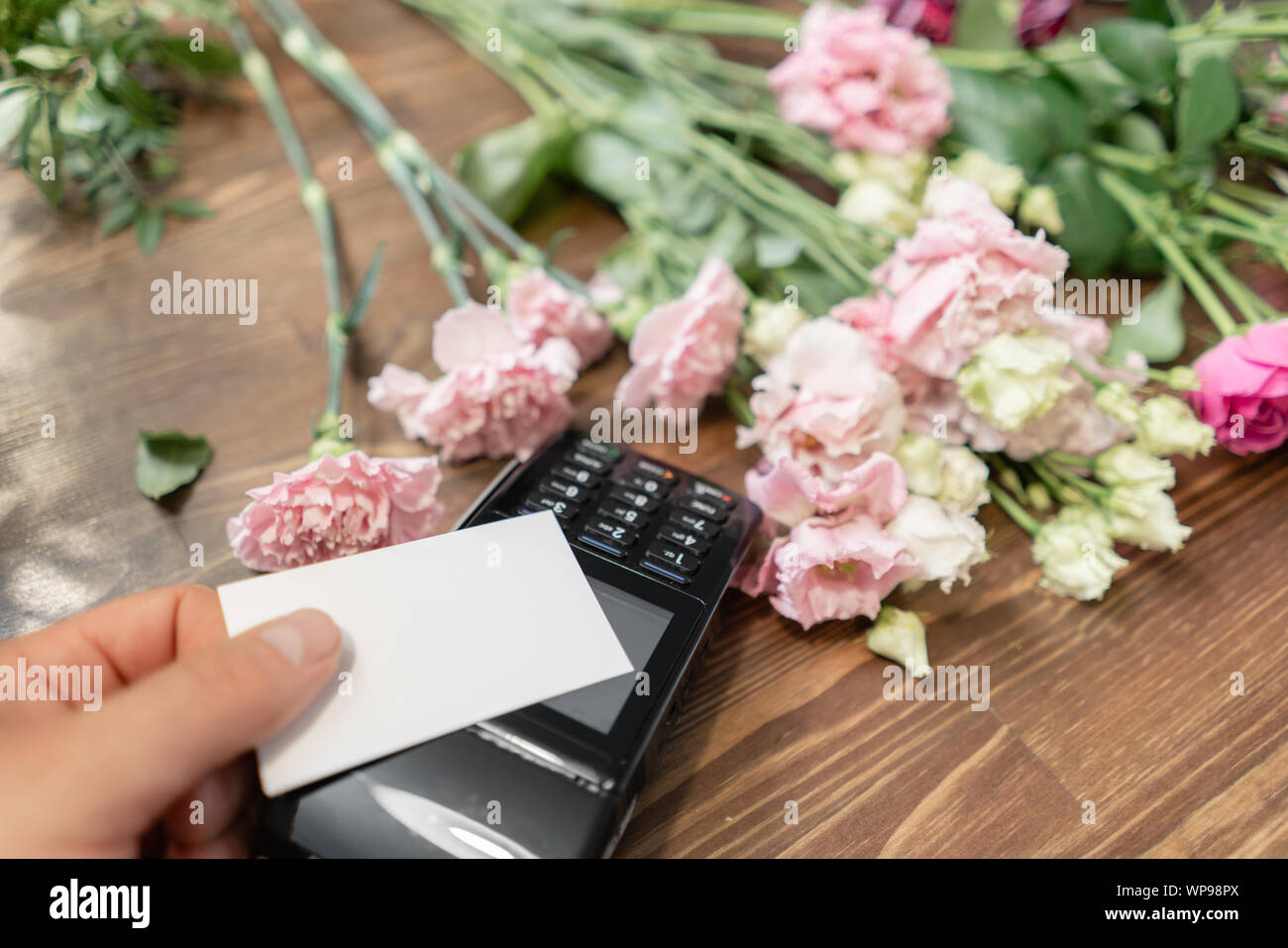Concept contactless payment. Making payment with credit card and pos ...