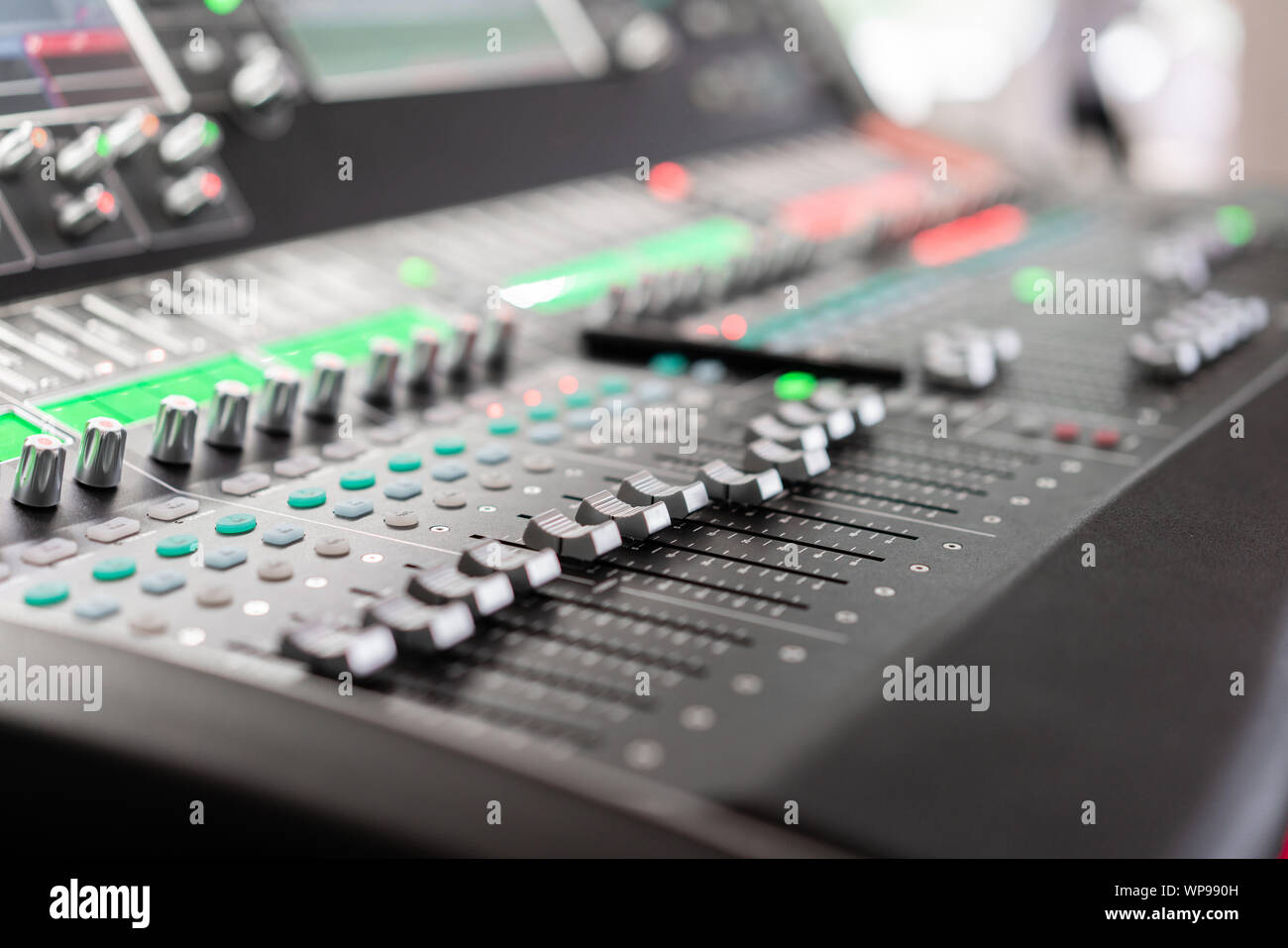 Sound mixer. Professional audio mixing console with lights, buttons ...