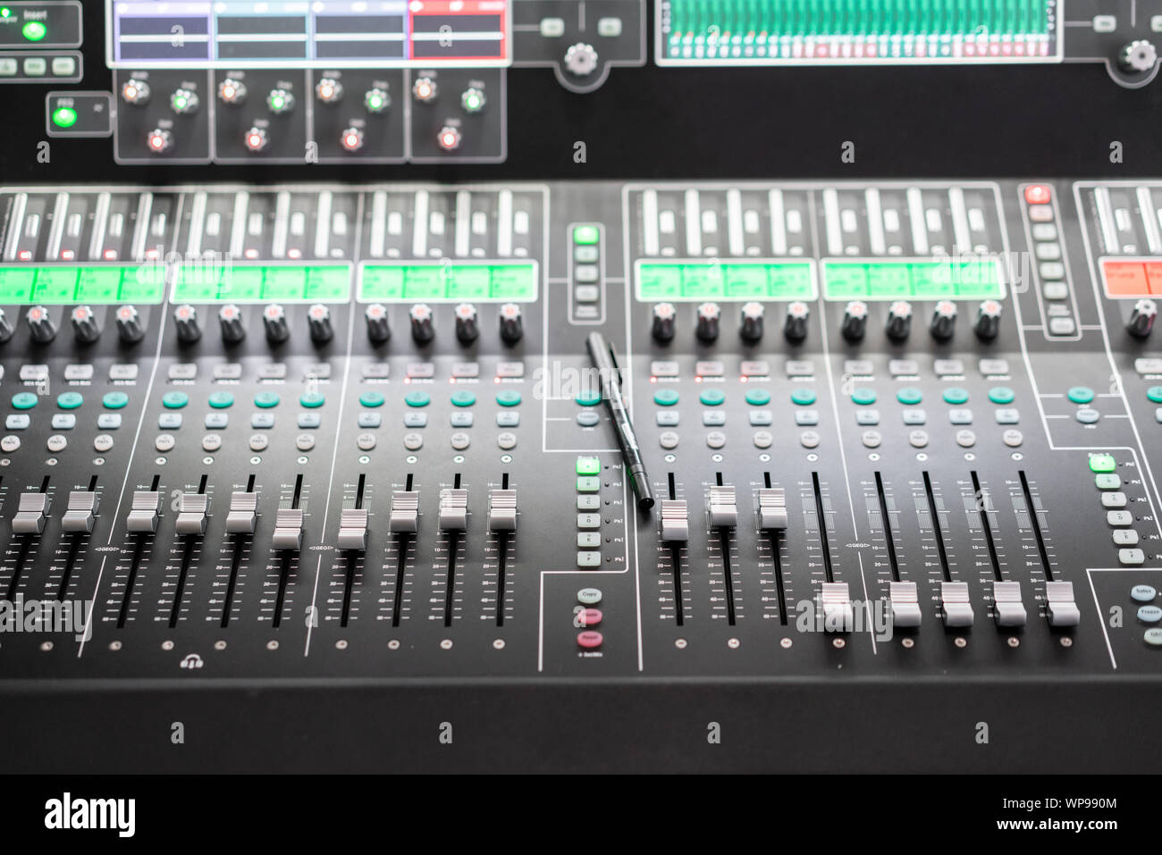 Sound mixer. Professional audio mixing console with lights, buttons ...