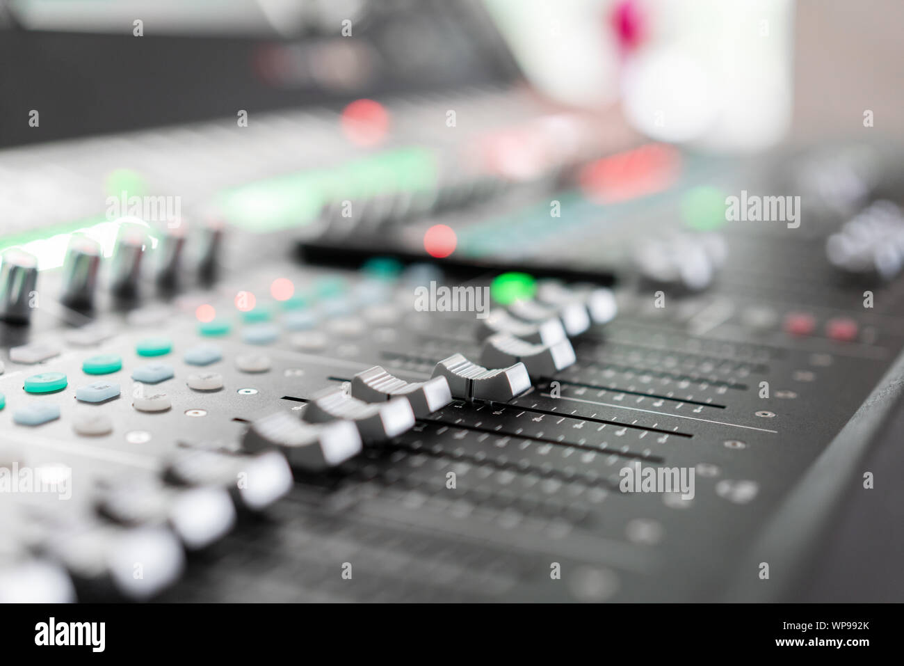 Sound mixer. Professional audio mixing console with lights, buttons ...