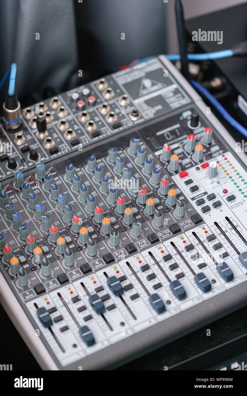 Sound mixer. Professional audio mixing console with lights, buttons ...