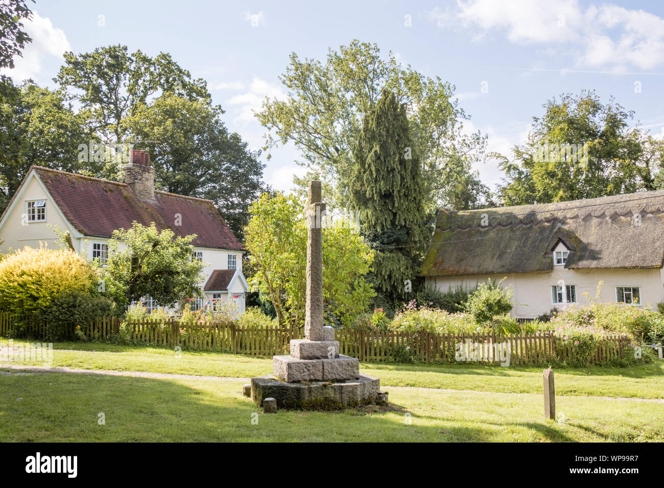 The village green and thatched cottages at Earl Soham, Suffolk, England ...