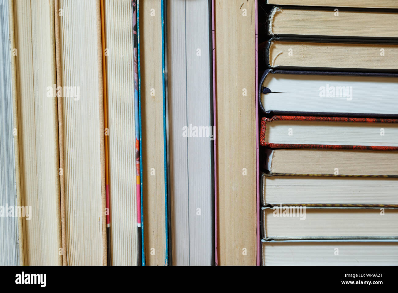 Books stack texture and background Stock Photo - Alamy