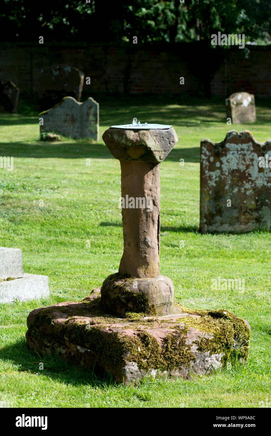 An old sundial in St. Laurence`s churchyard, Meriden, West Midlands ...