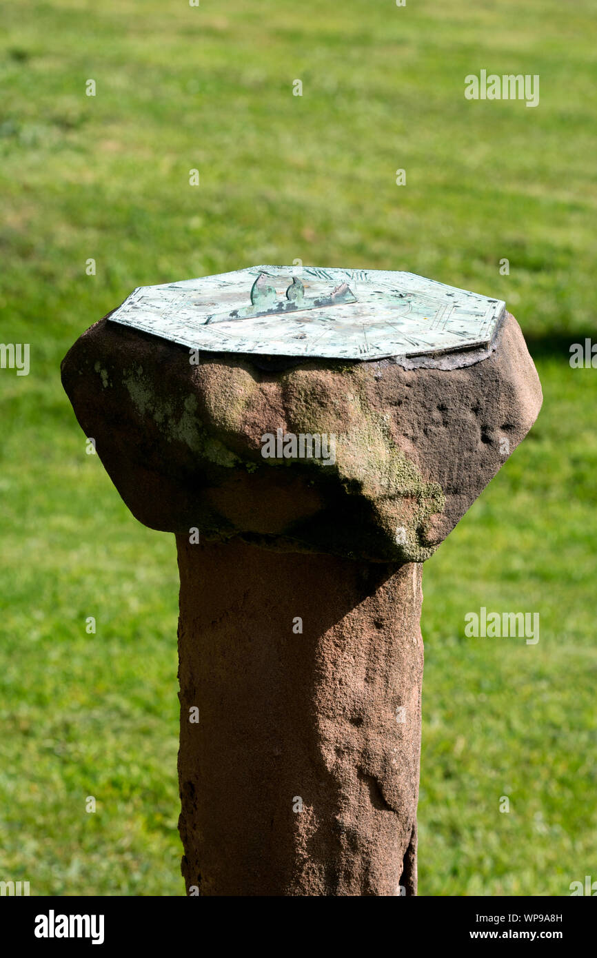 An old sundial in St. Laurence`s churchyard, Meriden, West Midlands ...
