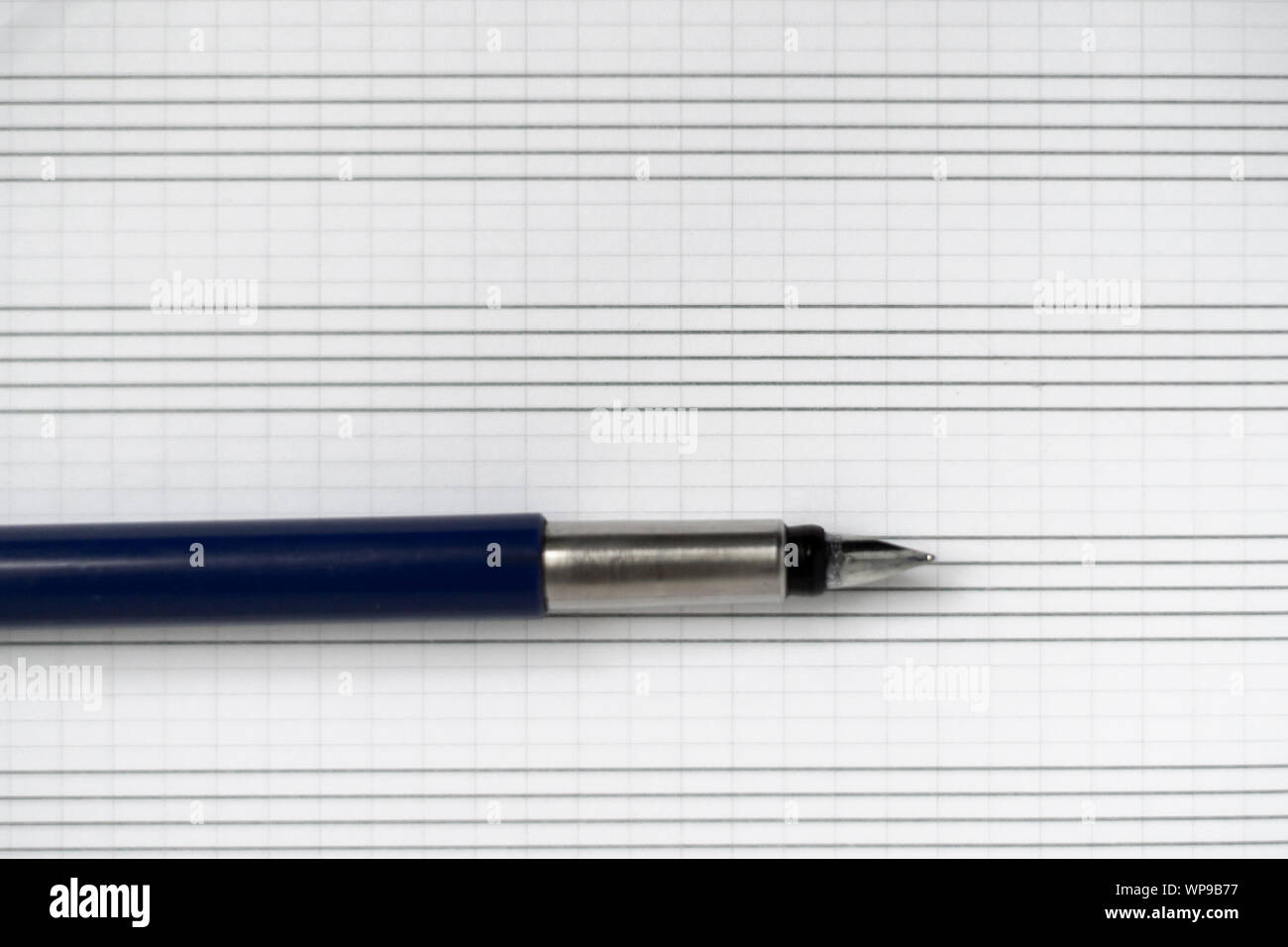 empty blank music notebook with fountain pen, copy space mockup, macro ...