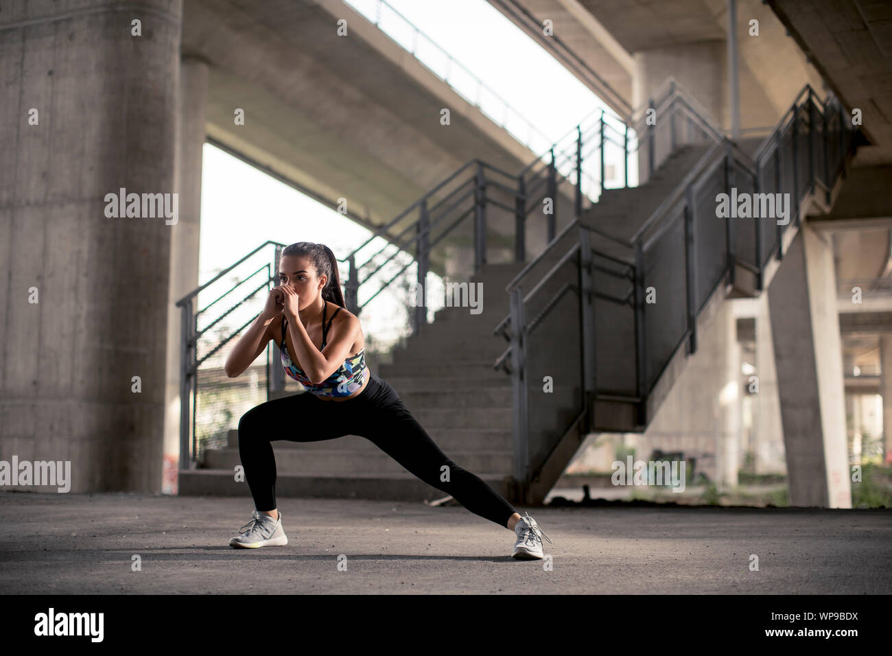 Pretty young woman exercise in hi-res stock photography and images - Alamy