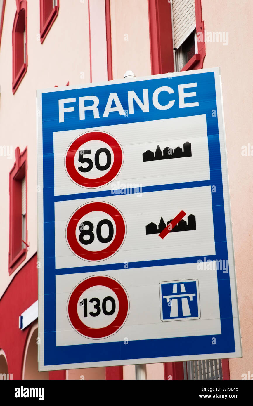 View at sign of speed limits at the French border Stock Photo - Alamy