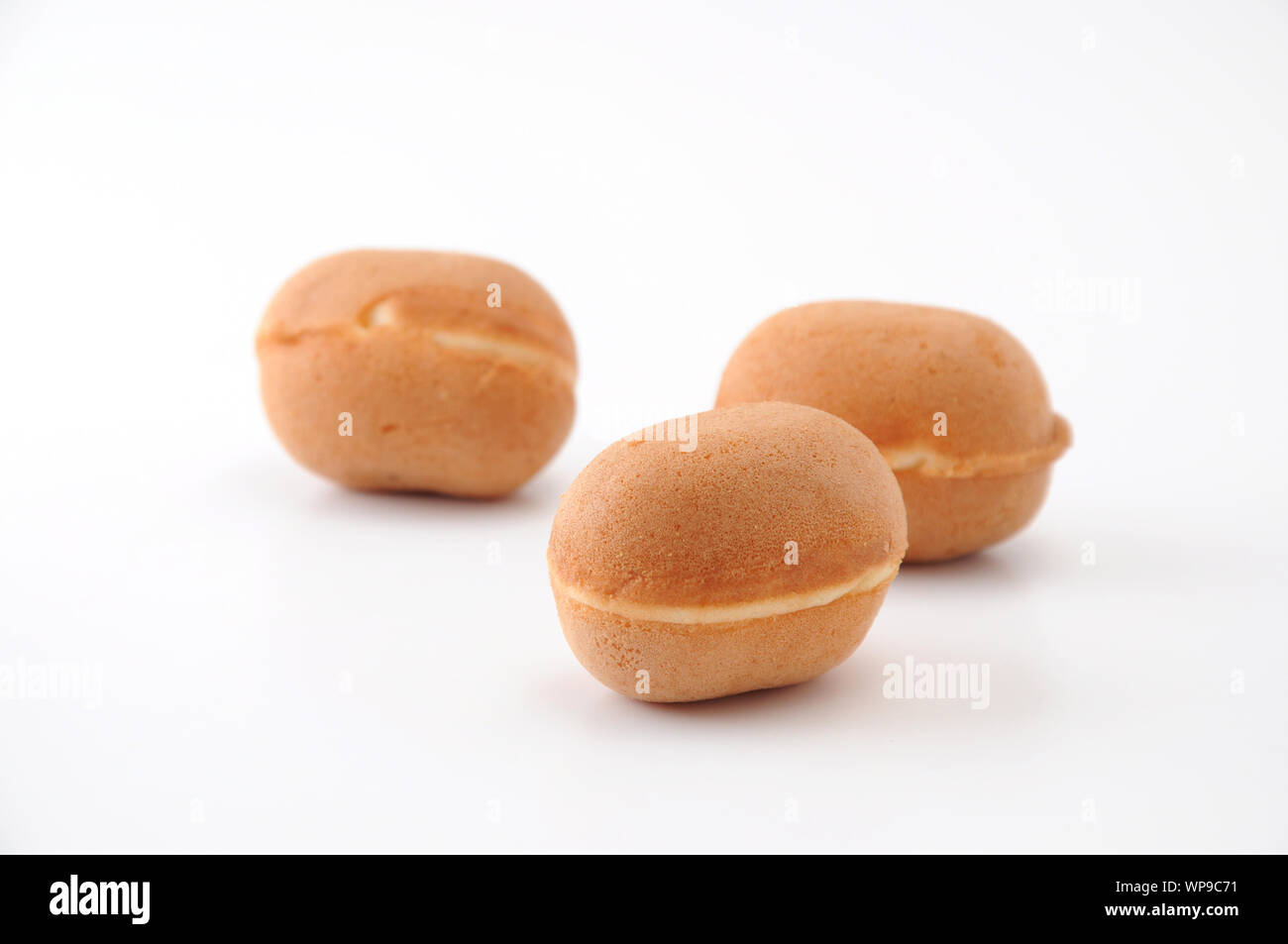 baby kasutera 3 ball sponge cakes isolated on white background Stock ...