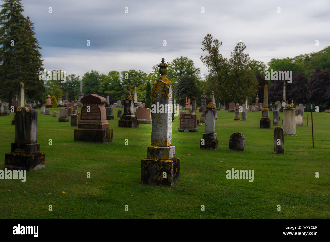 Ancient cemetery grounds showing aged tomb stones Stock Photo - Alamy
