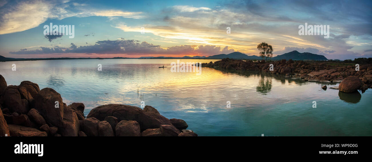 Sunset at Gaborone dam, in Botswana after a short rainfall Stock Photo ...
