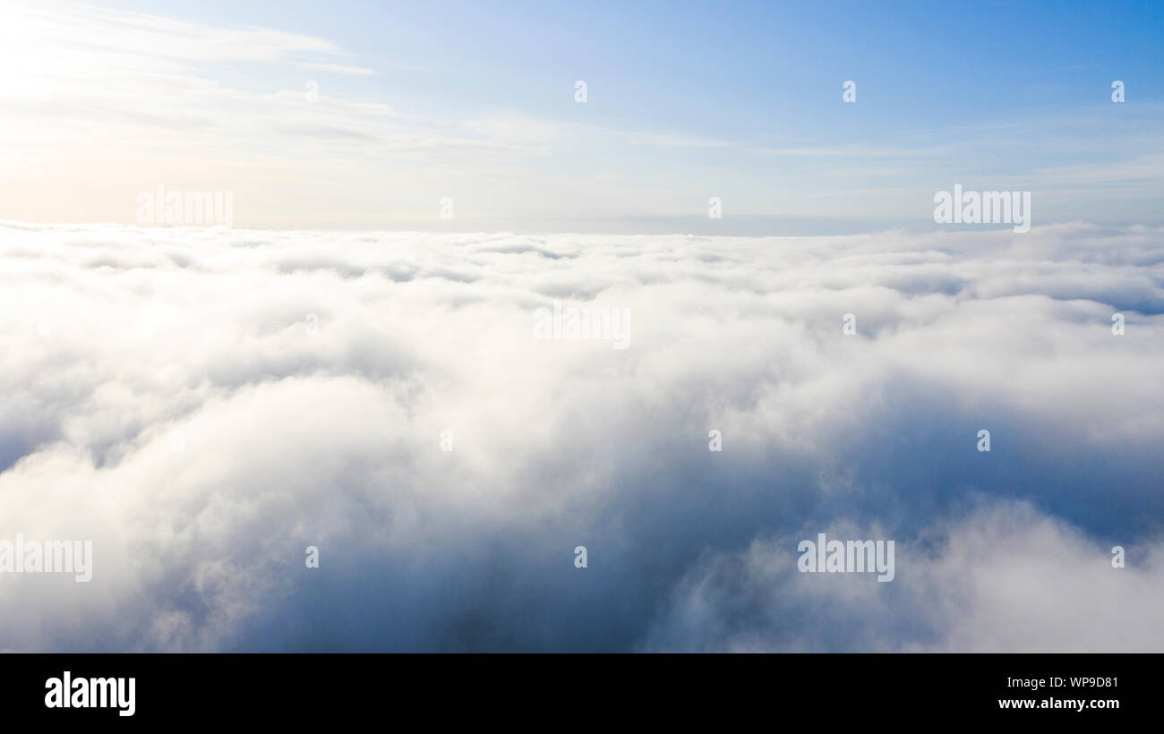 Aerial view White clouds in blue sky. Top view. View from drone. Aerial bird's eye view. Aerial ...
