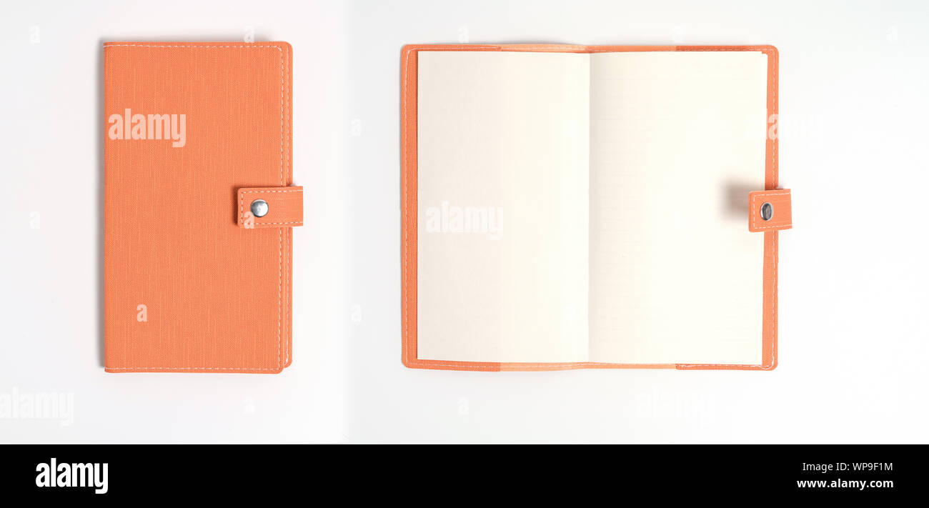 top view blank orange leather diary on white desk Stock Photo - Alamy