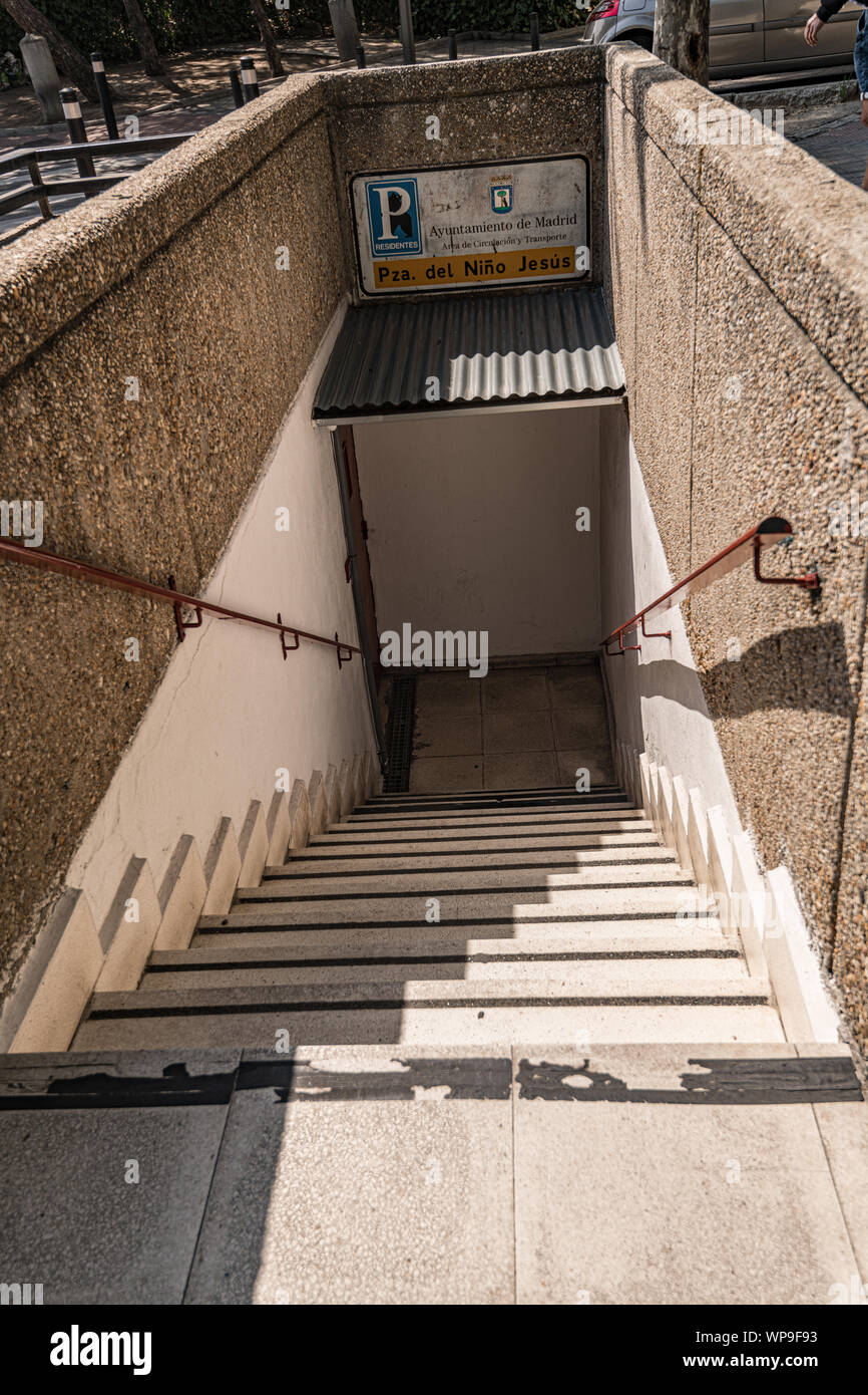 Steps down to underground car park Stock Photo - Alamy