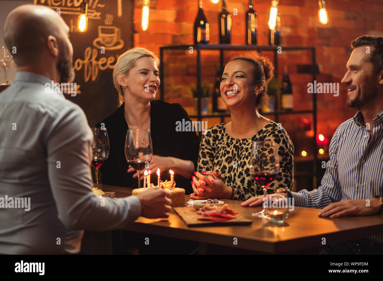 Tapas bar with bar man and man sitting at bar hi-res stock photography ...