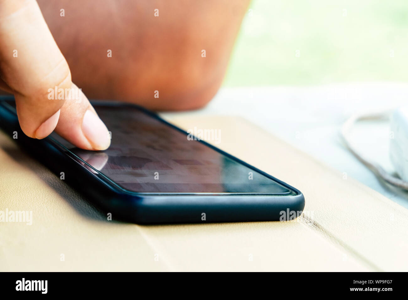 image of people using a smartphone Stock Photo - Alamy