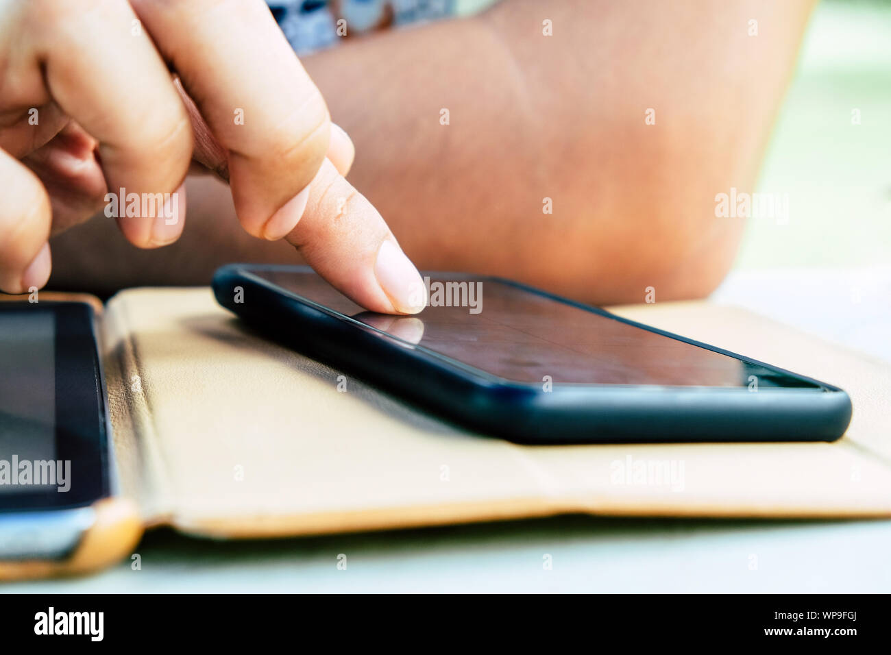 image of people using a smartphone Stock Photo - Alamy