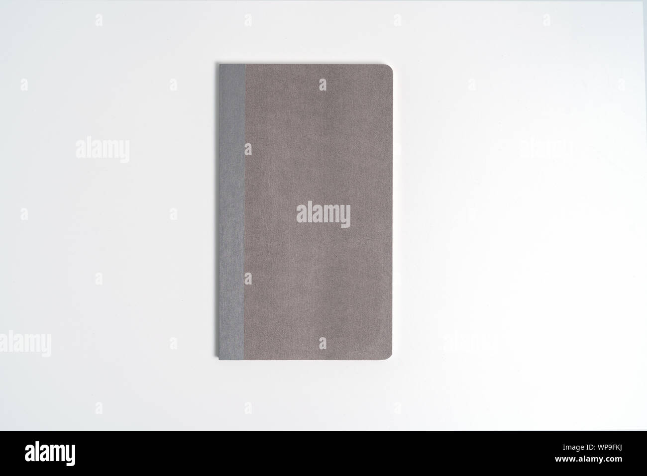 gray notebook isolated on white background.top view Stock Photo - Alamy