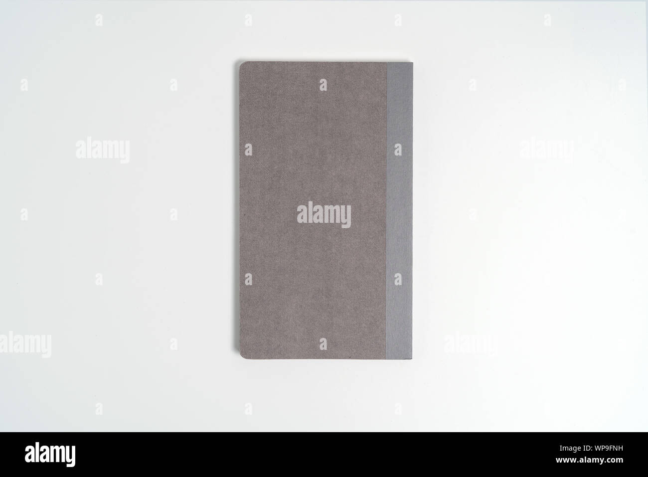 gray notebook isolated on white background.top view Stock Photo - Alamy