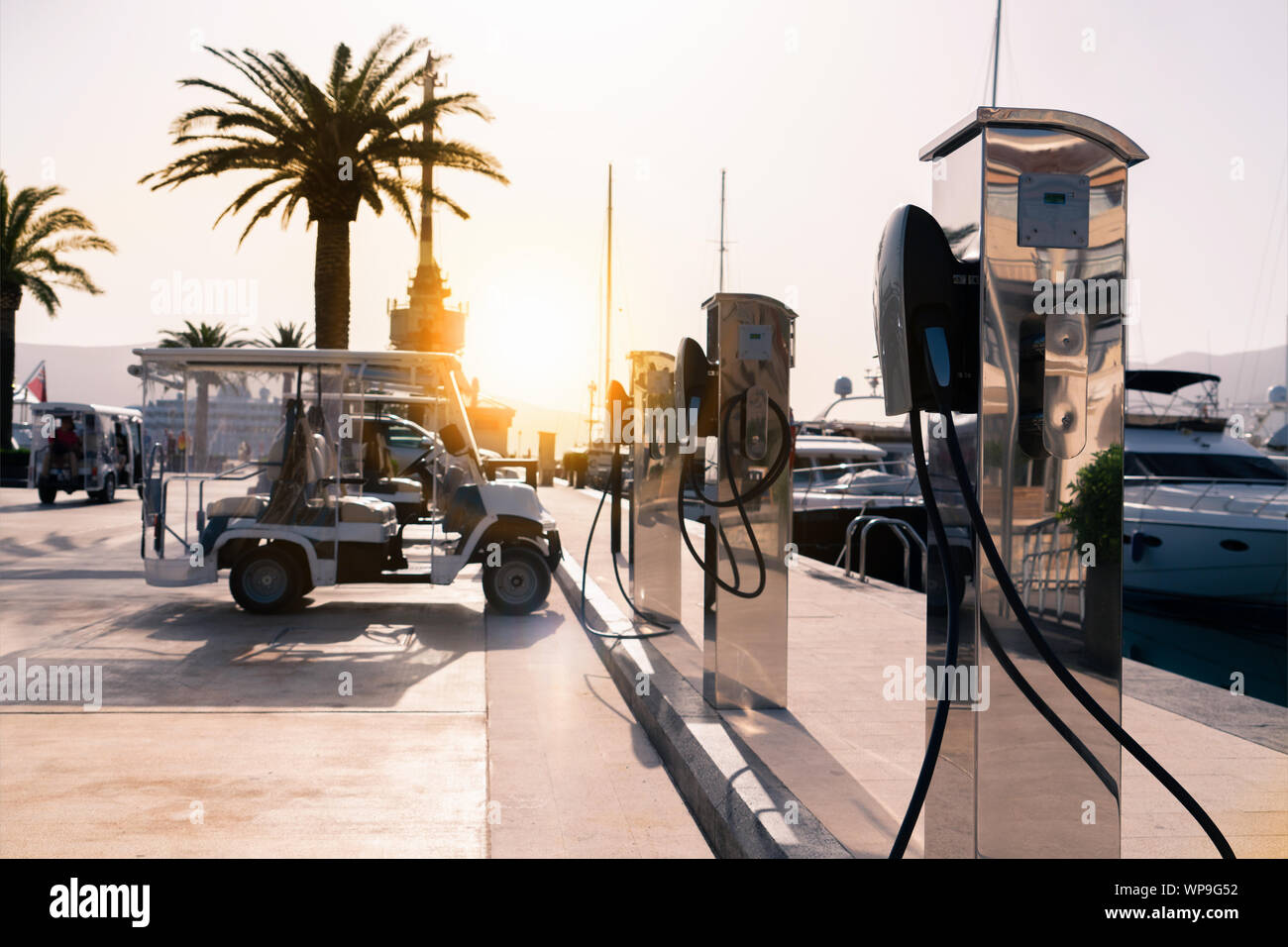 Electric car charging station in luxury marina by the sea Stock Photo ...