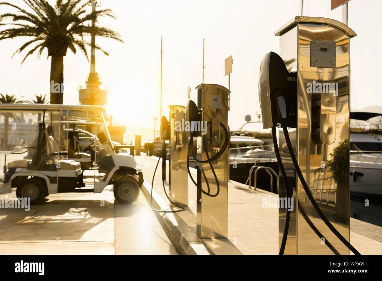Electric car charging station in luxury marina by the sea Stock Photo ...