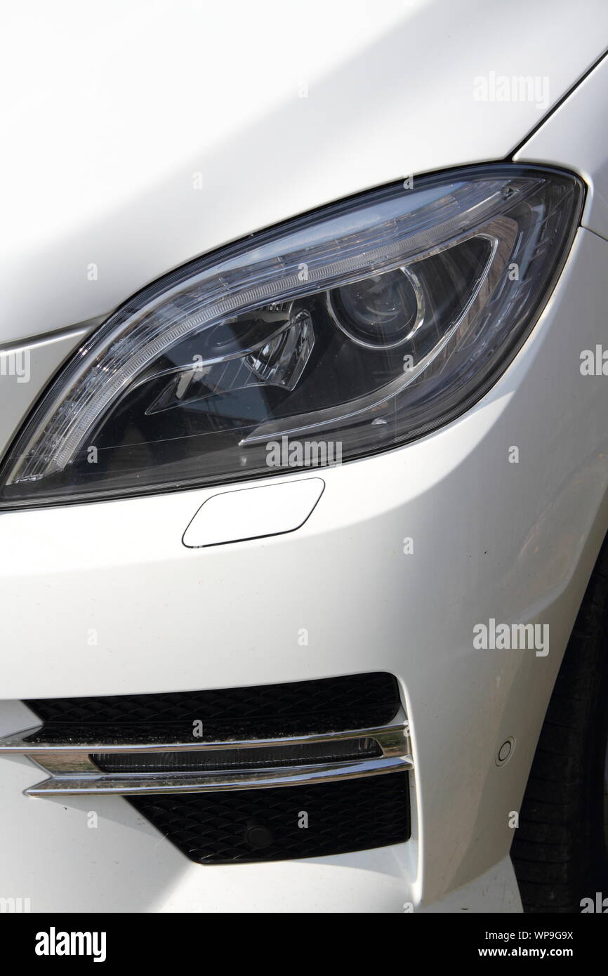 a white car with modern headlight Stock Photo - Alamy