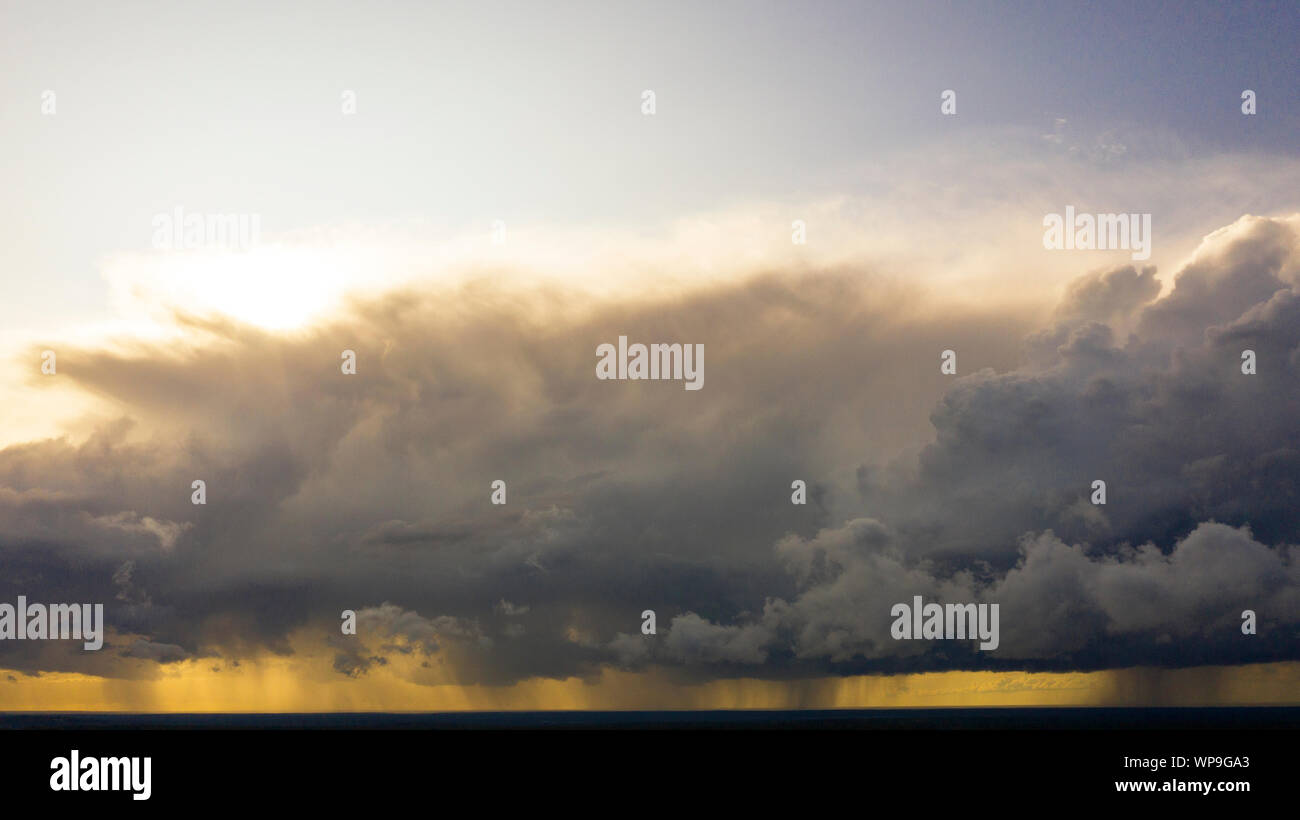 Aerial image of dark Storm clouds over the land. Aerial panorama of ...