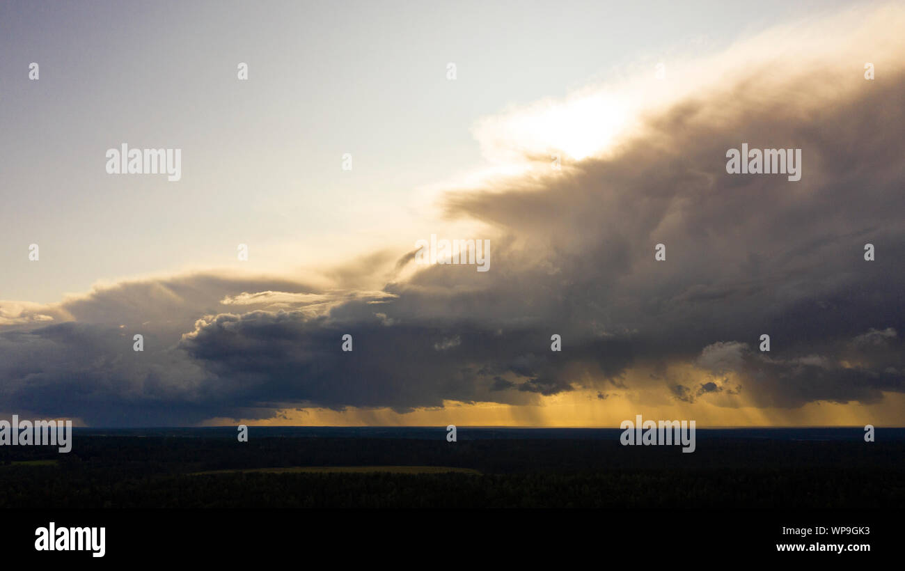 Aerial image of dark Storm clouds over the land. Aerial panorama of ...