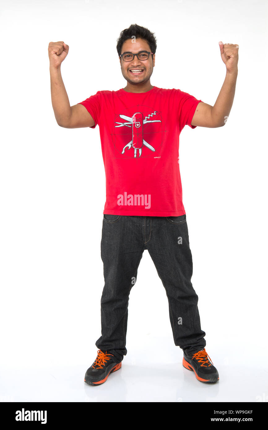 Young man celebrating his success Stock Photo - Alamy