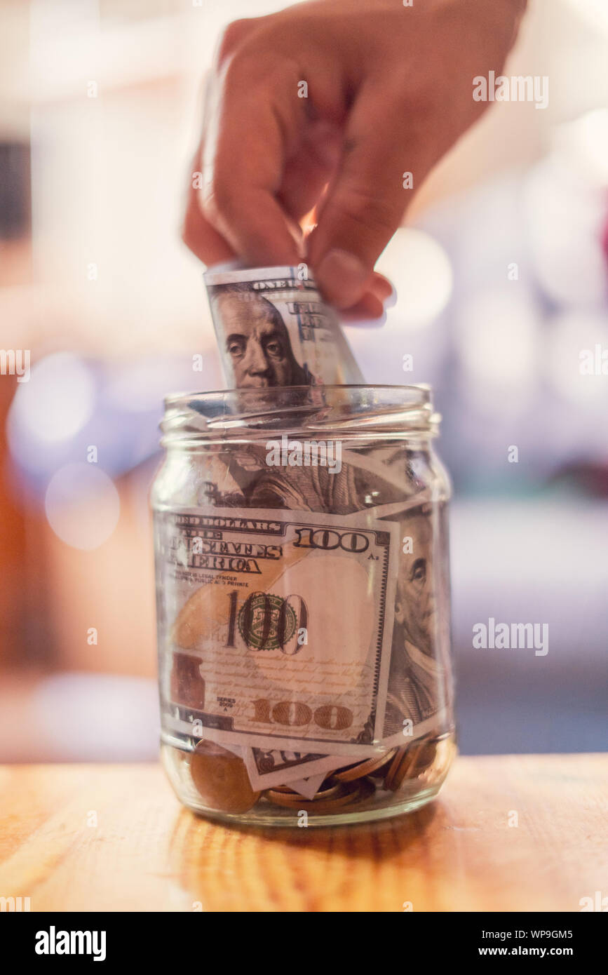 Hand bottle bank hi-res stock photography and images - Alamy