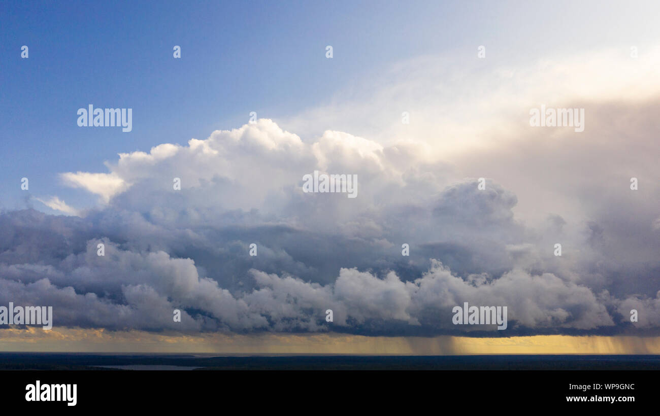 Aerial image of dark Storm clouds over the land. Aerial panorama of ...