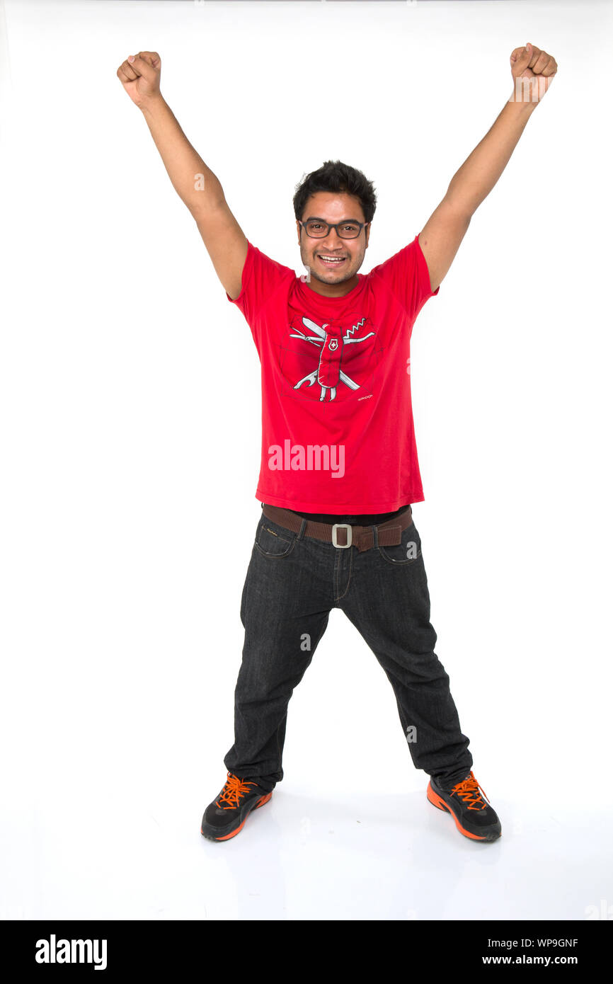 Young man celebrating his success Stock Photo - Alamy
