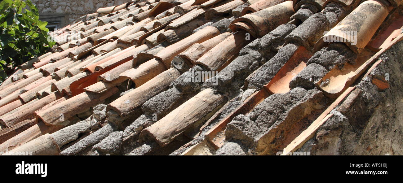 an old broken tile roof Stock Photo - Alamy