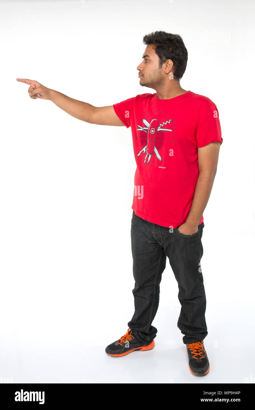 Young man showing something Stock Photo - Alamy