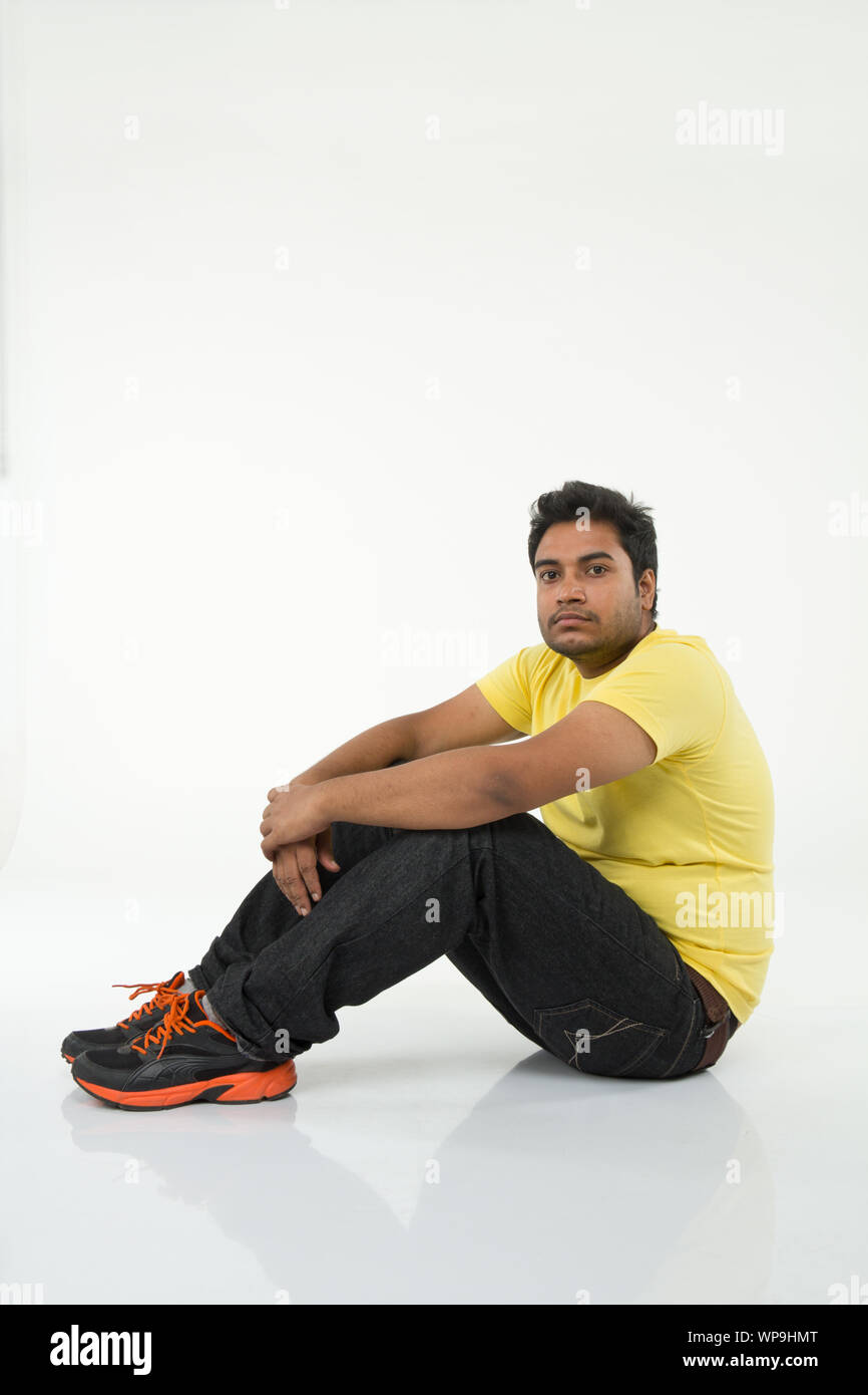 Man sitting on floor indian hi-res stock photography and images - Alamy