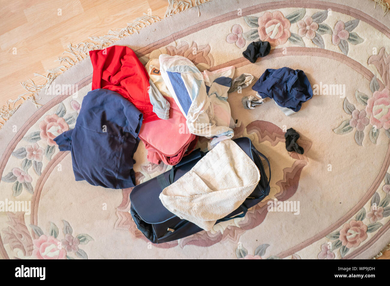 Suitcase packing mess hi-res stock photography and images - Alamy