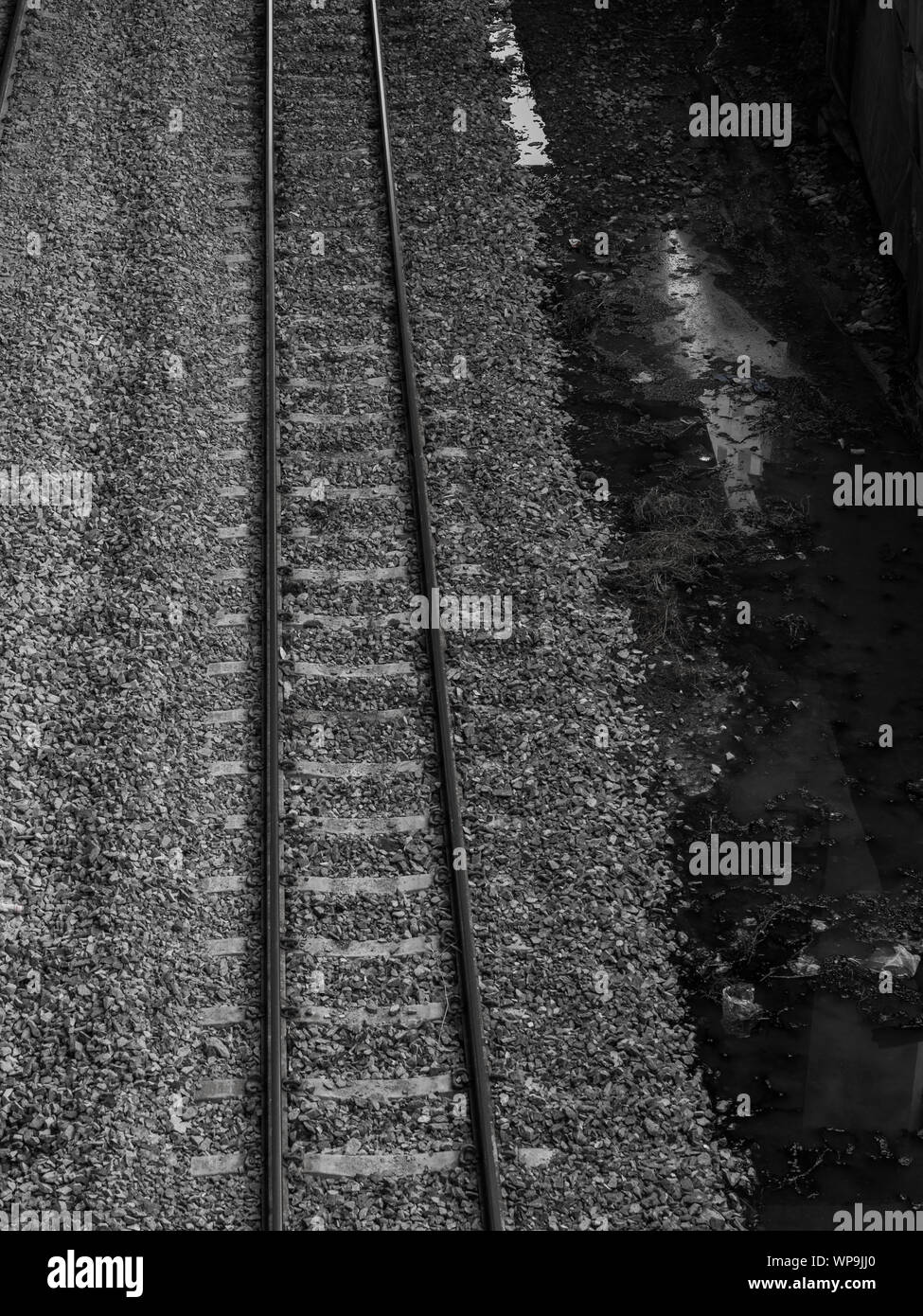 Monochrome outdoor photo of railway tracks Stock Photo - Alamy