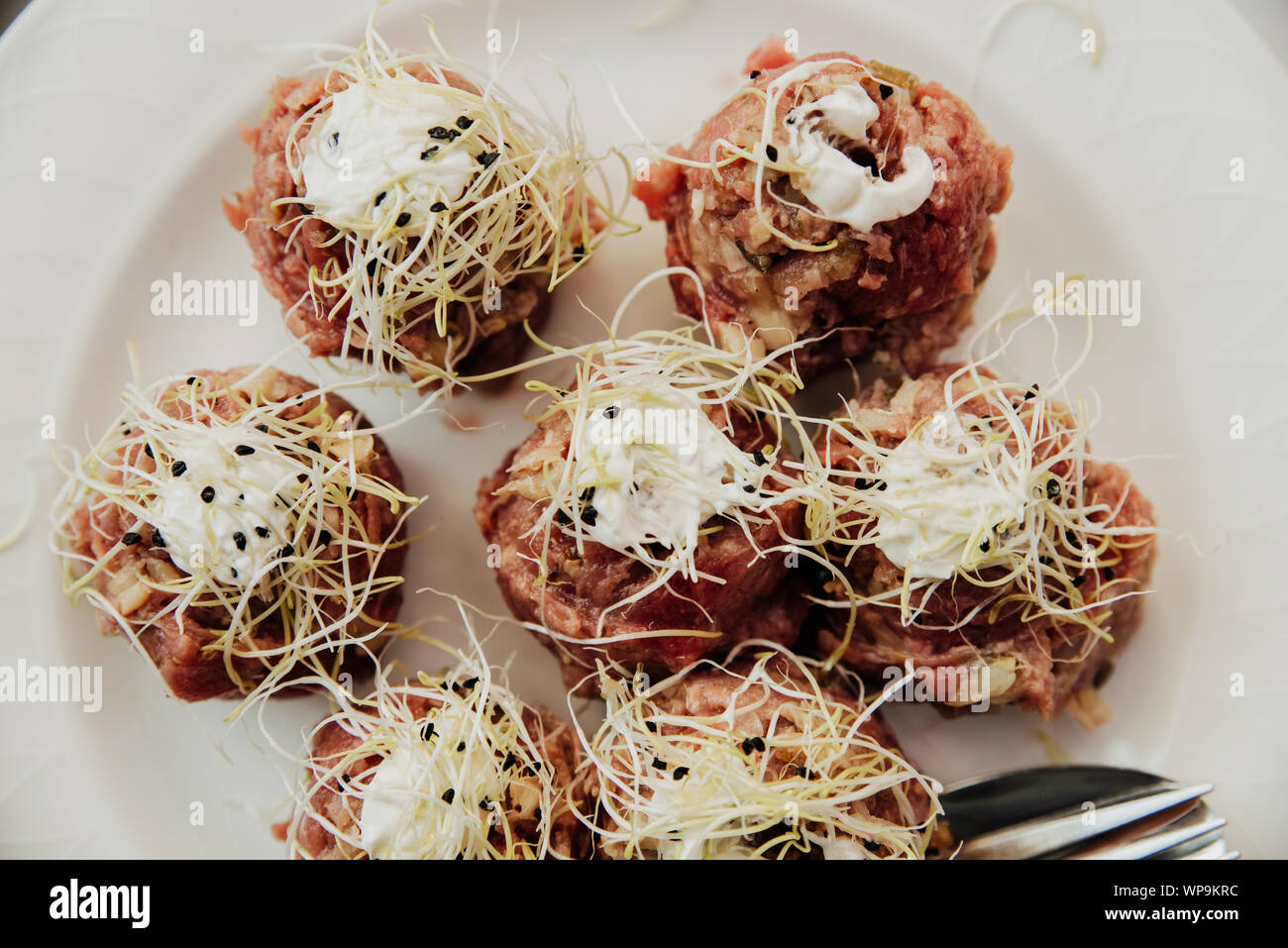 Close up on tartare with parmezan cheese Stock Photo - Alamy