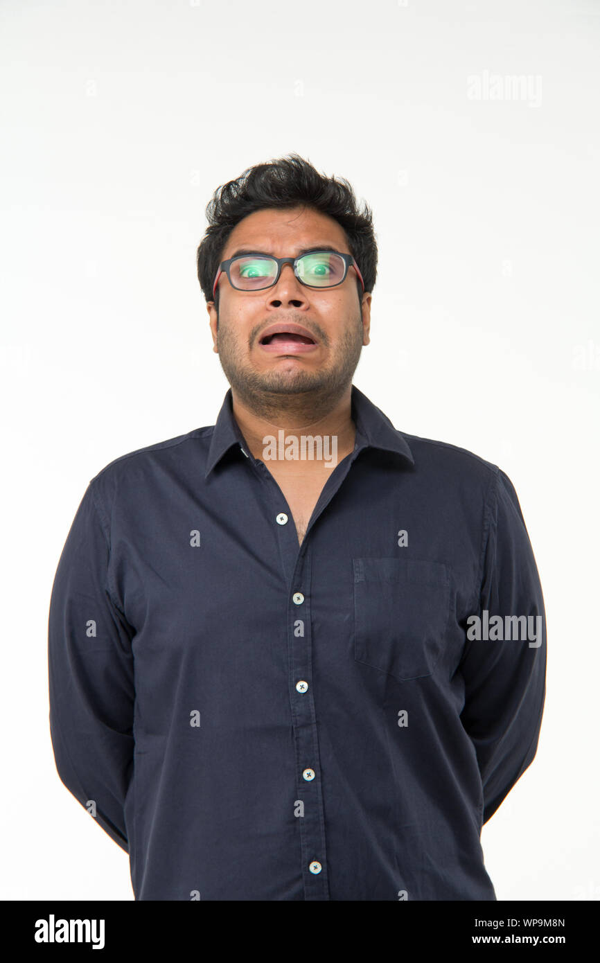 Indian man face looking down hi-res stock photography and images - Alamy