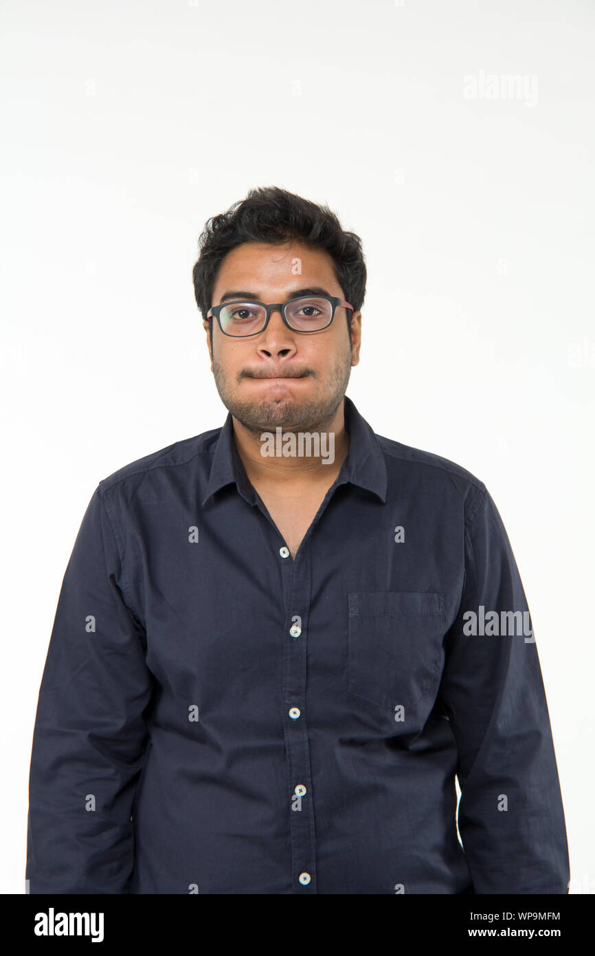 Sad young man making a face Stock Photo - Alamy