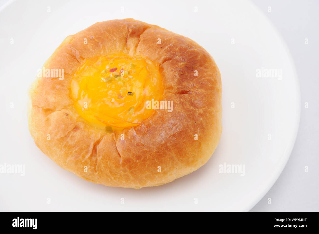 orange marmalade bread on plate isolated on white background Stock ...