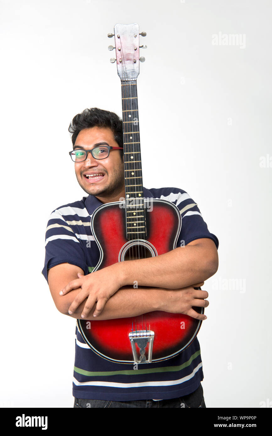 Hugging Guitar High Resolution Stock Photography and Images - Alamy