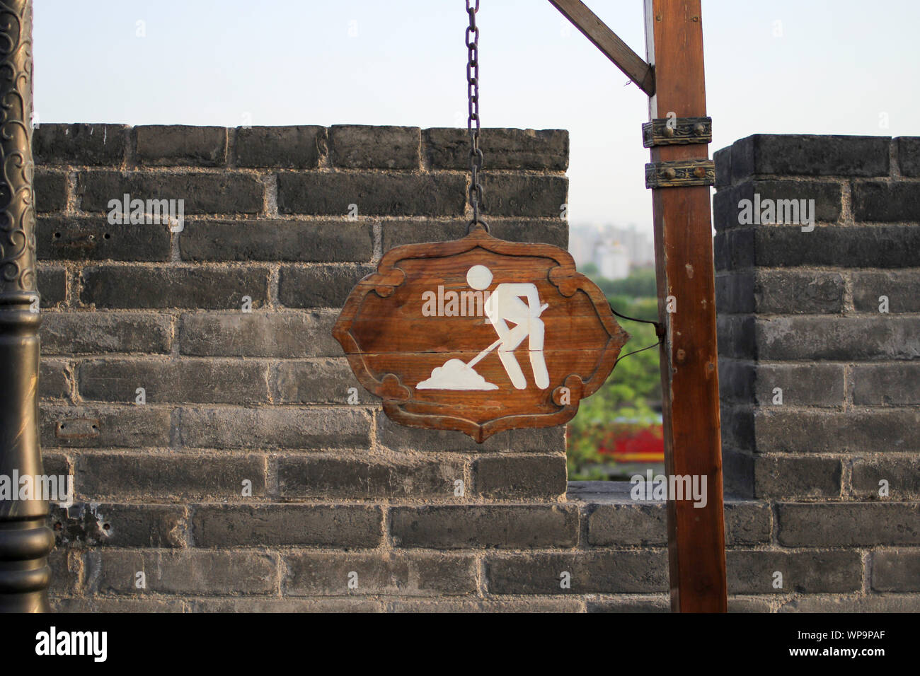 wooden signage board with construction warning Stock Photo - Alamy