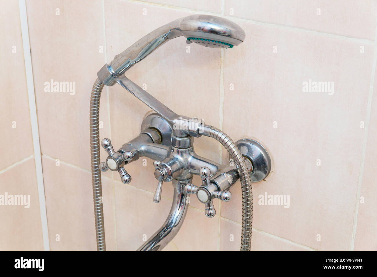 Old faucet the faucet Assembly in the bathroom. Limescale on chrome ...