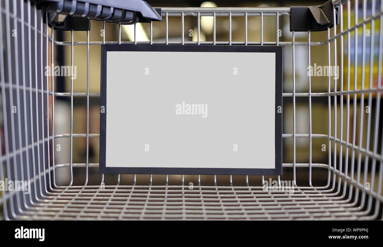 Closeup of a advertising sign in a Shopping cart. Horizontal image with ...