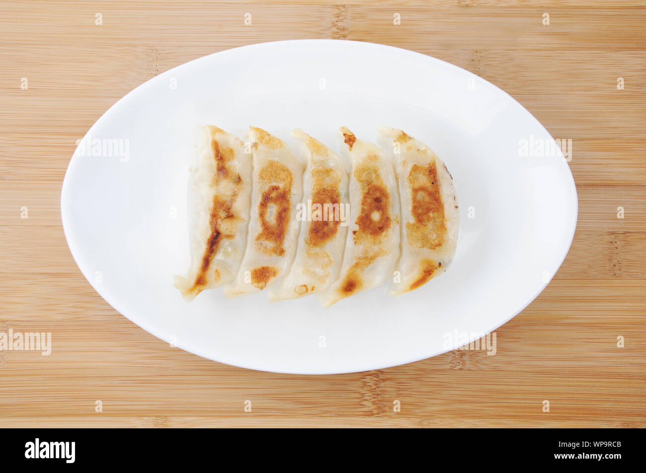 Cutting gyoza hi-res stock photography and images - Alamy