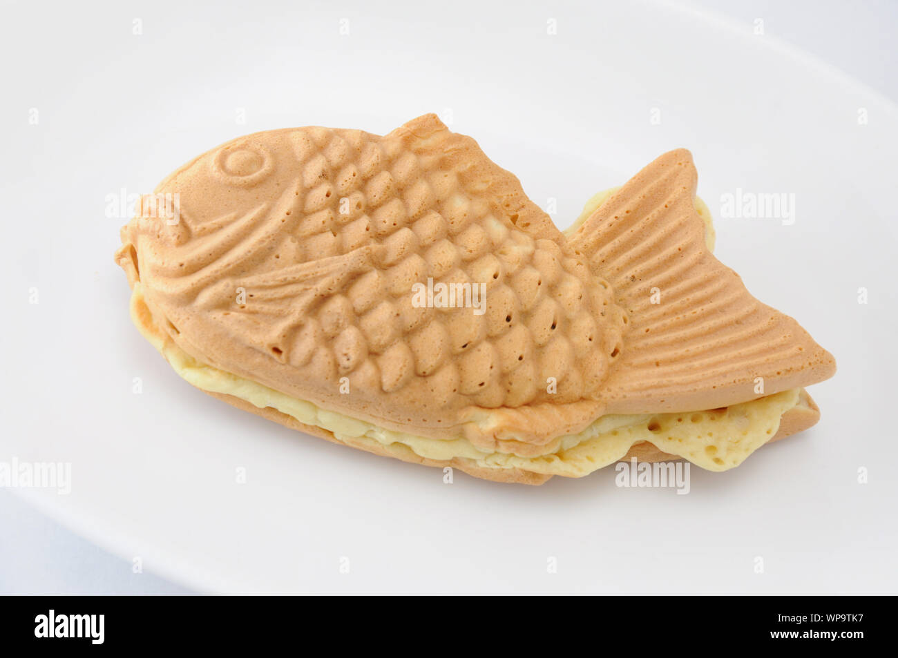 Japanese confectionery taiyaki fish cake wagashi on plate isolated on ...