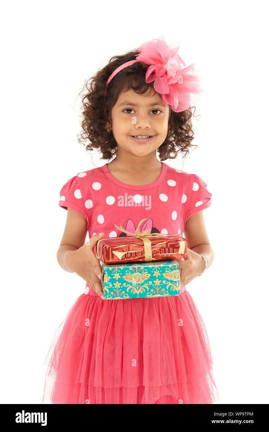 Girl holding pink wrapped gift box hi-res stock photography and images ...